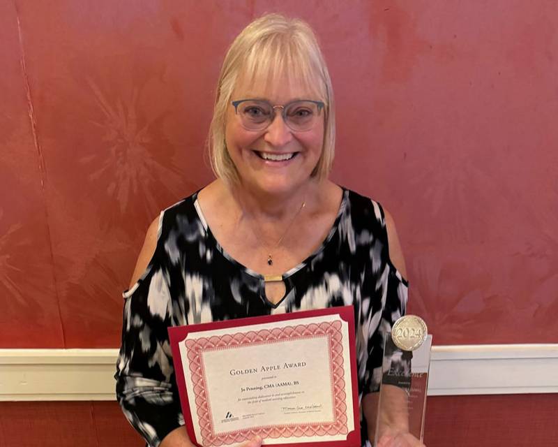 News - Jo Penning Receives Golden Apple Award - STC